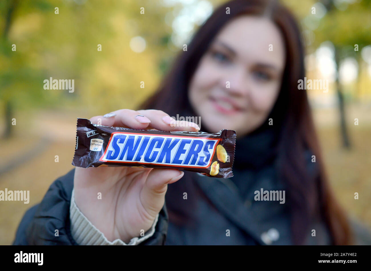 KHARKOV, UKRAINE - OCTOBER 8, 2019: A young caucasian brunette girl ...