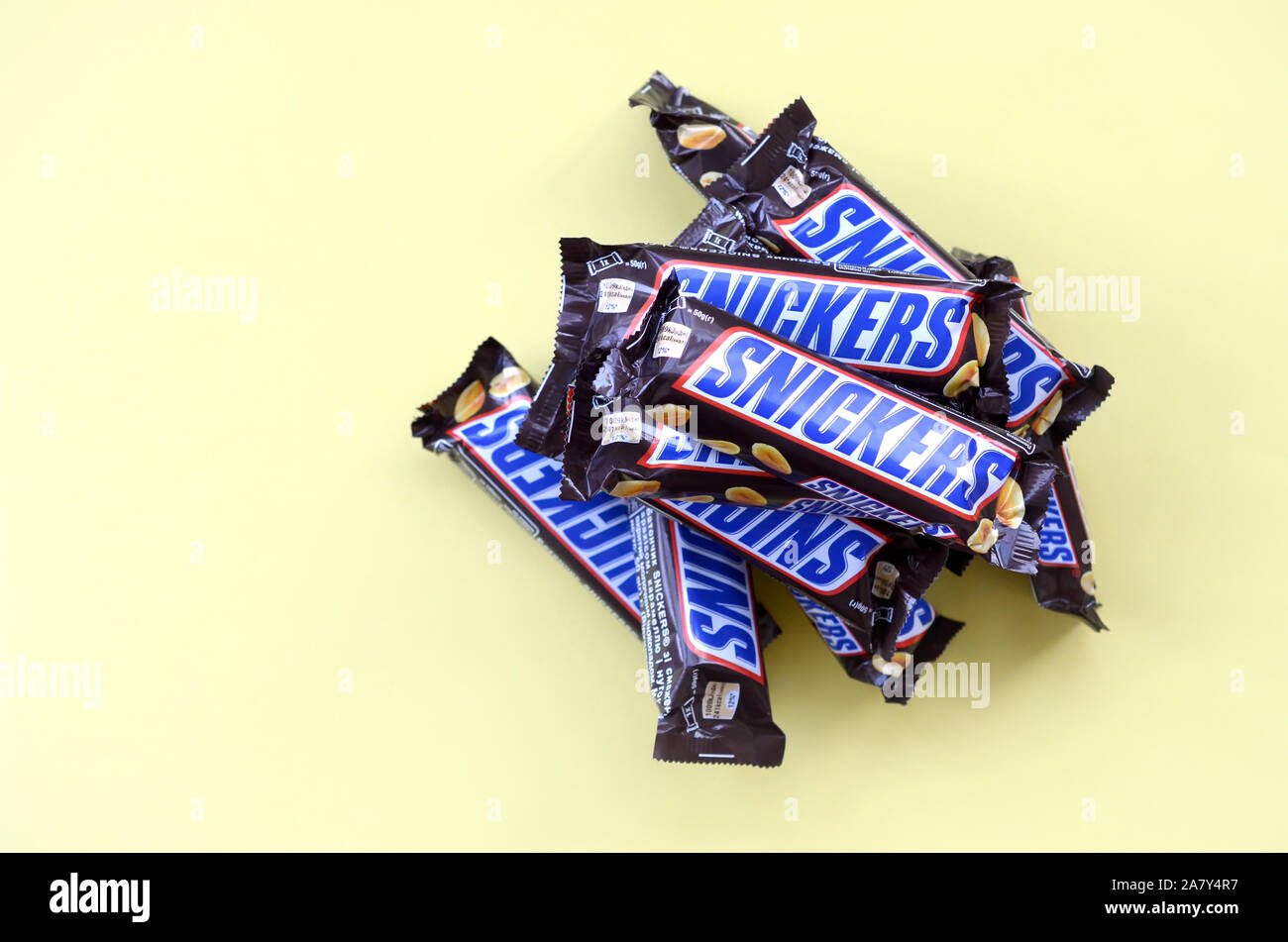 KHARKOV, UKRAINE - OCTOBER 2, 2019: Many Snickers chocolate bars lies ...