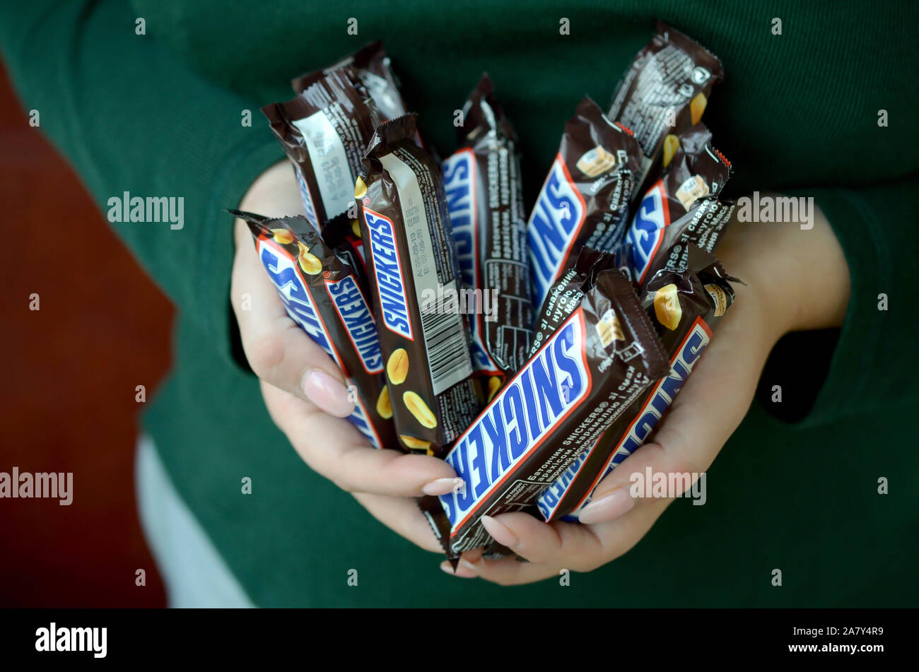 KHARKOV, UKRAINE - OCTOBER 8, 2019: A young caucasian brunette girl ...