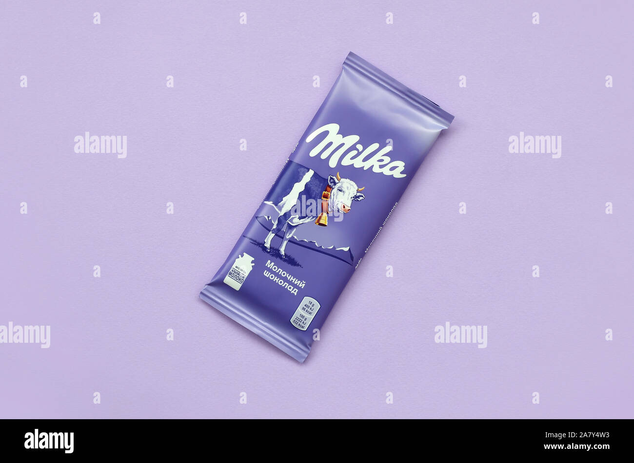 KHARKOV, UKRAINE - OCTOBER 23, 2019: Milka chocolate tablet in classic ...