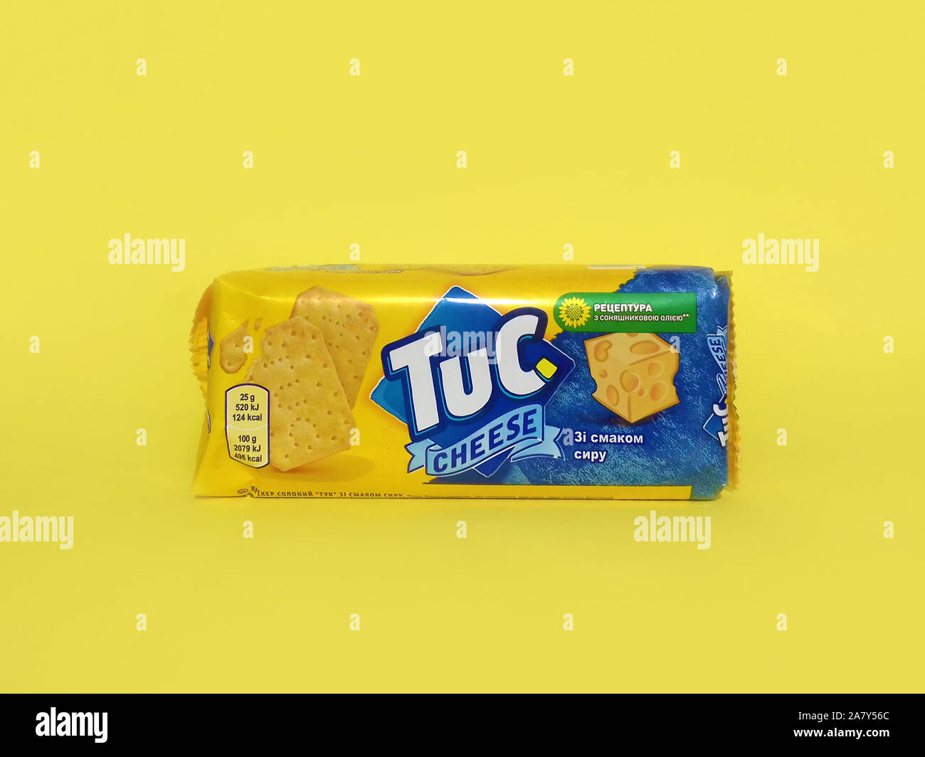 KHARKOV, UKRAINE - NOVEMBER 1, 2019: Tuc snack pack on bright yellow ...
