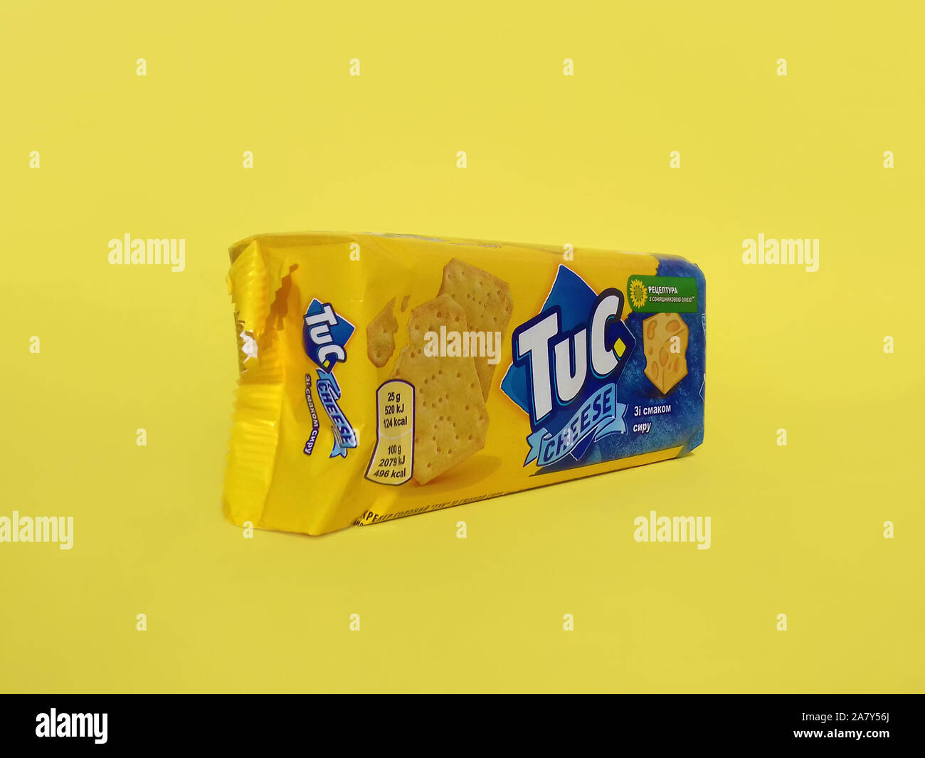 KHARKOV, UKRAINE - NOVEMBER 1, 2019: Tuc snack pack on bright yellow ...