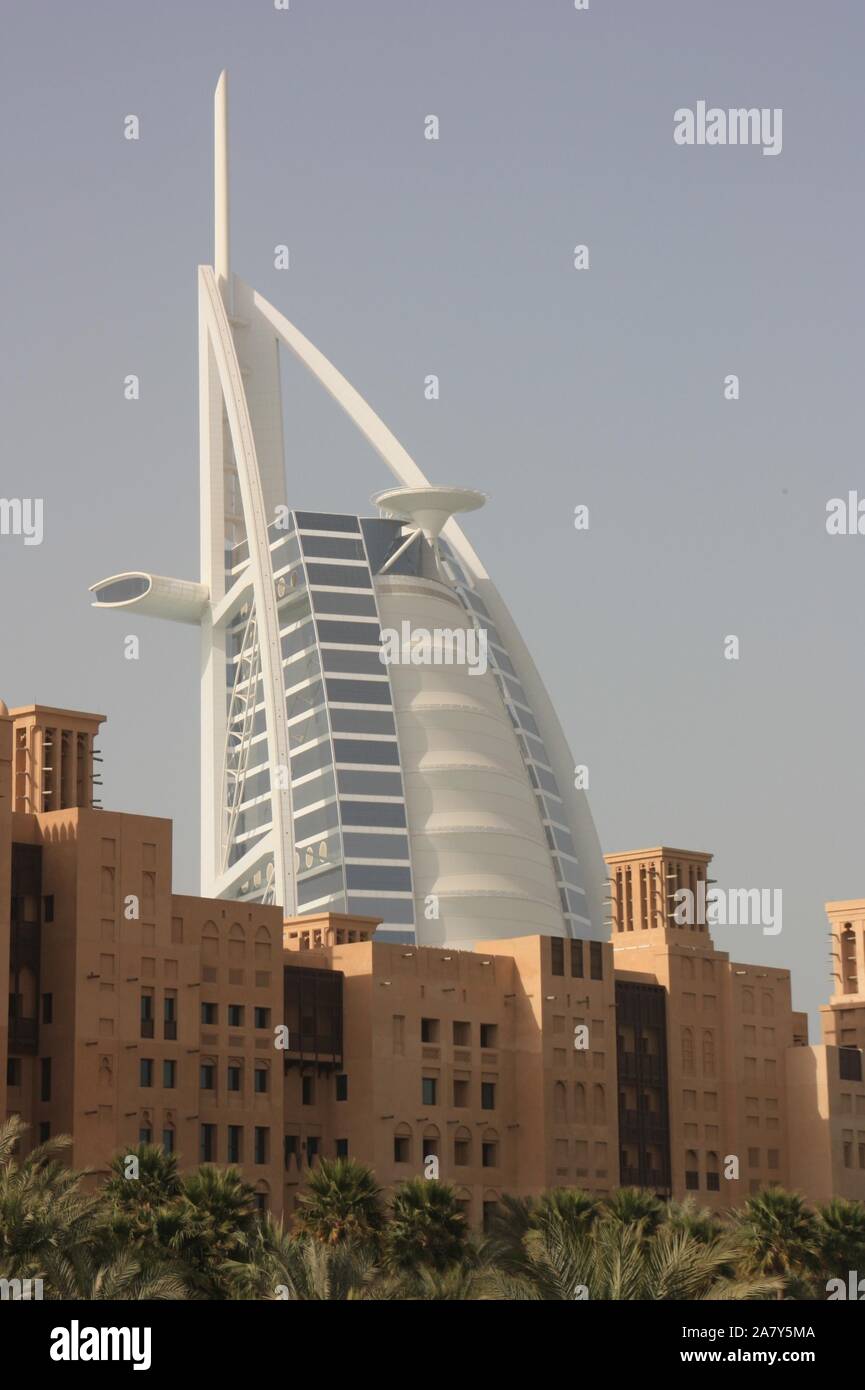 Exterior view of the Burj Al Arab luxury hotel rising behind the ...