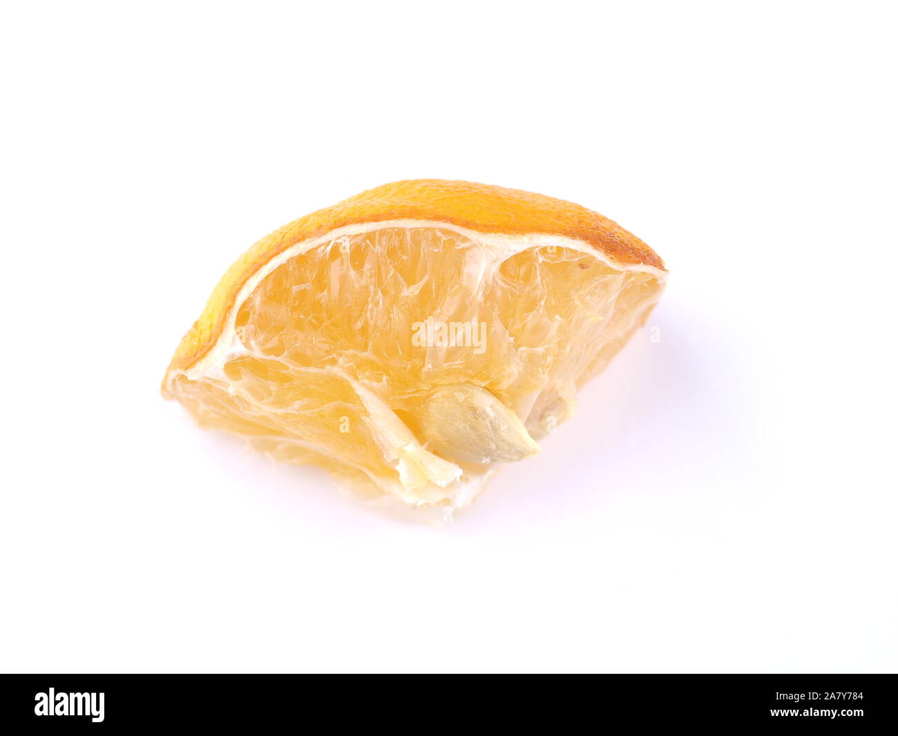 dried yellow lemon on a white background Stock Photo - Alamy