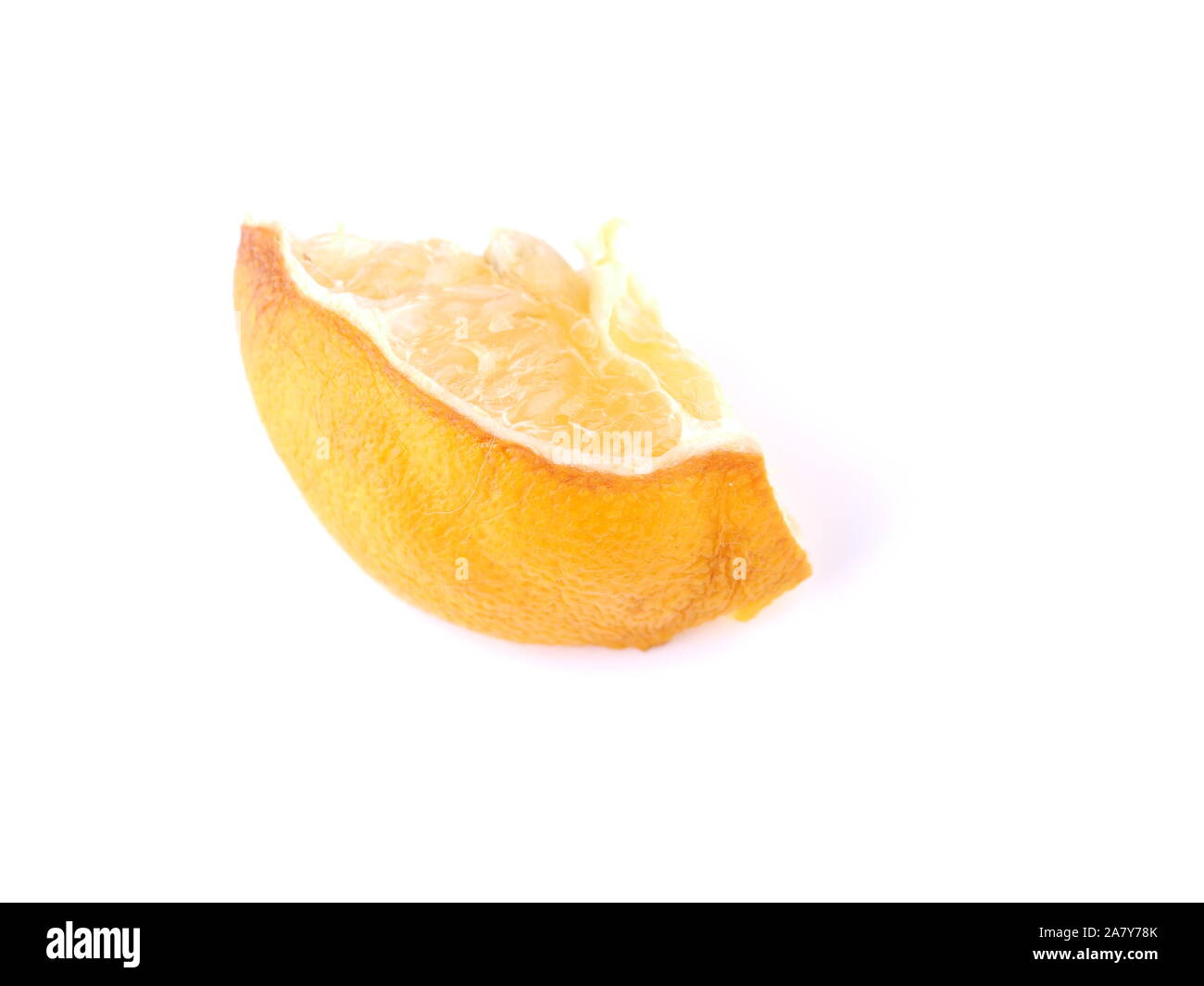 dried yellow lemon on a white background Stock Photo - Alamy