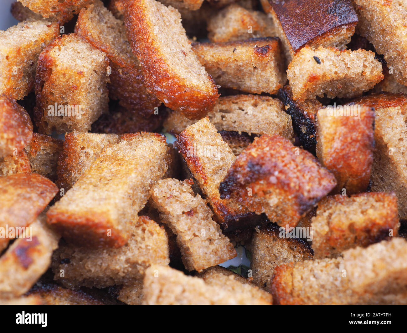 fried croutons on a white background Stock Photo - Alamy
