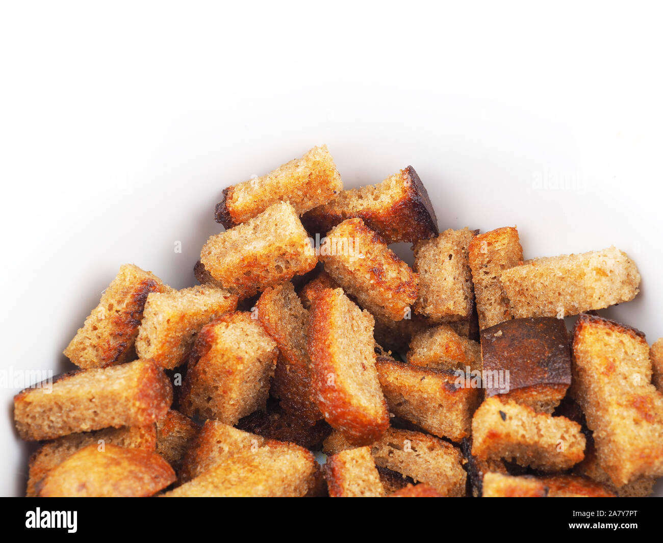 fried croutons on a white background Stock Photo - Alamy