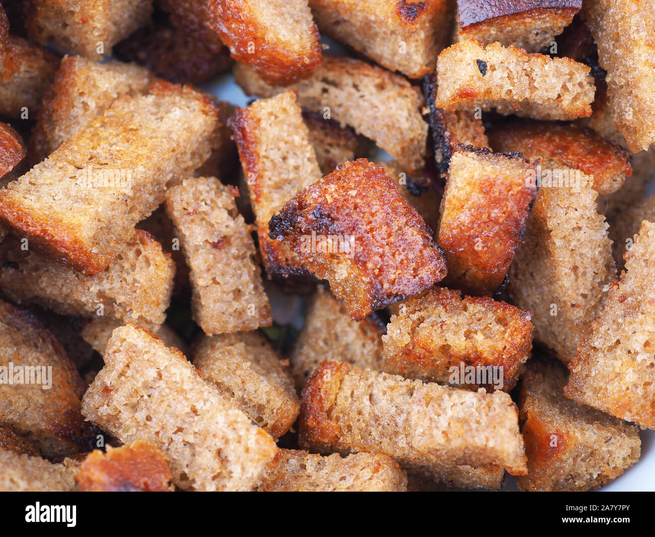 fried croutons on a white background Stock Photo - Alamy