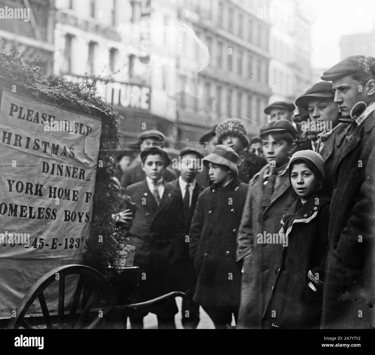 Collecting money for New York City home for homeless boys charity Stock ...