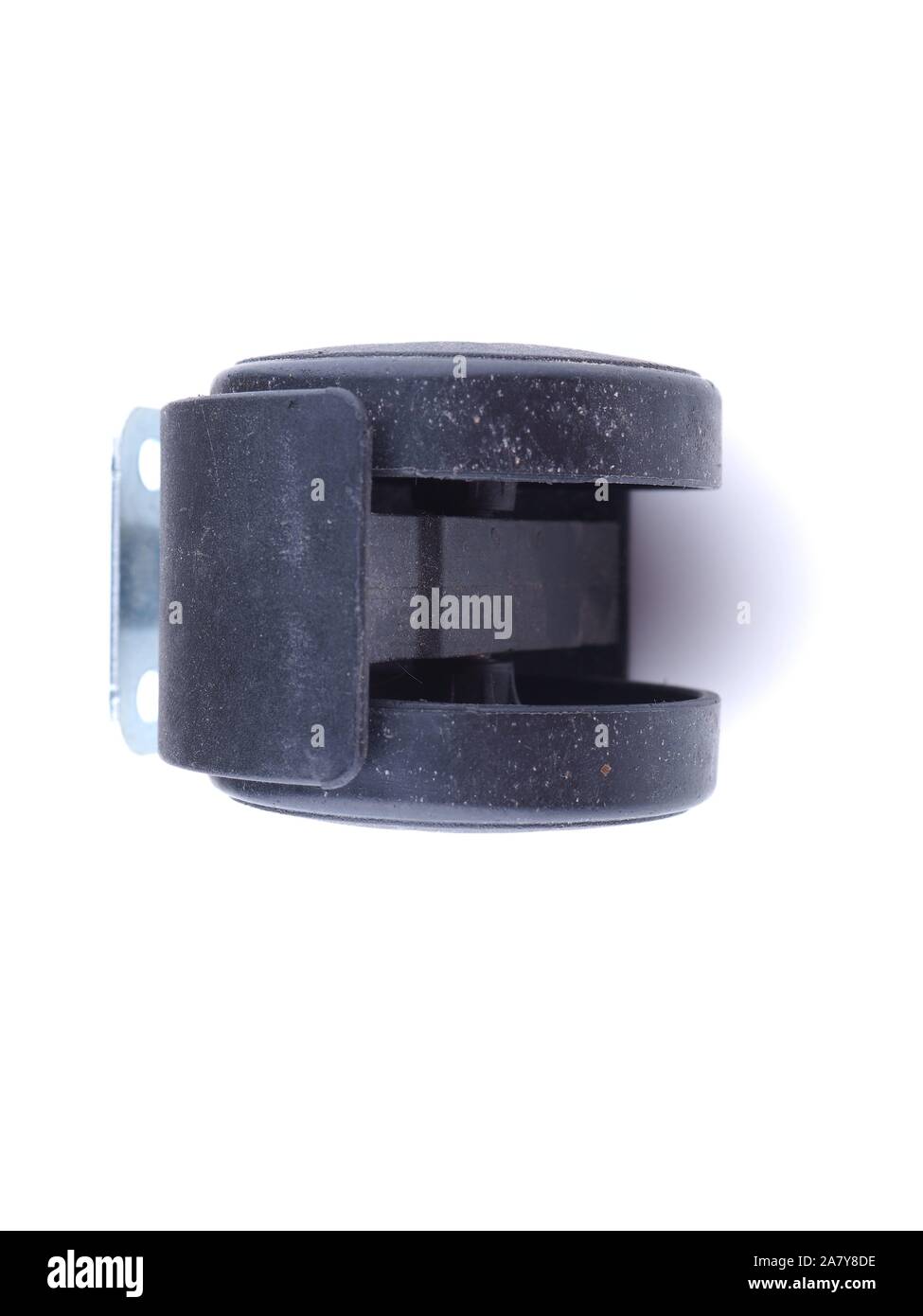 plastic black wheels on a white background Stock Photo - Alamy