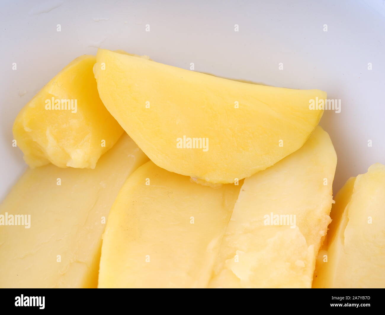 boiled potatoes on white background Stock Photo - Alamy