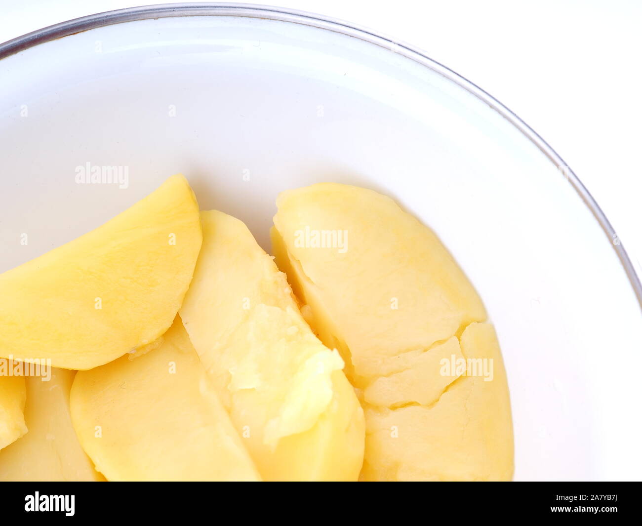 boiled potatoes on white background Stock Photo - Alamy