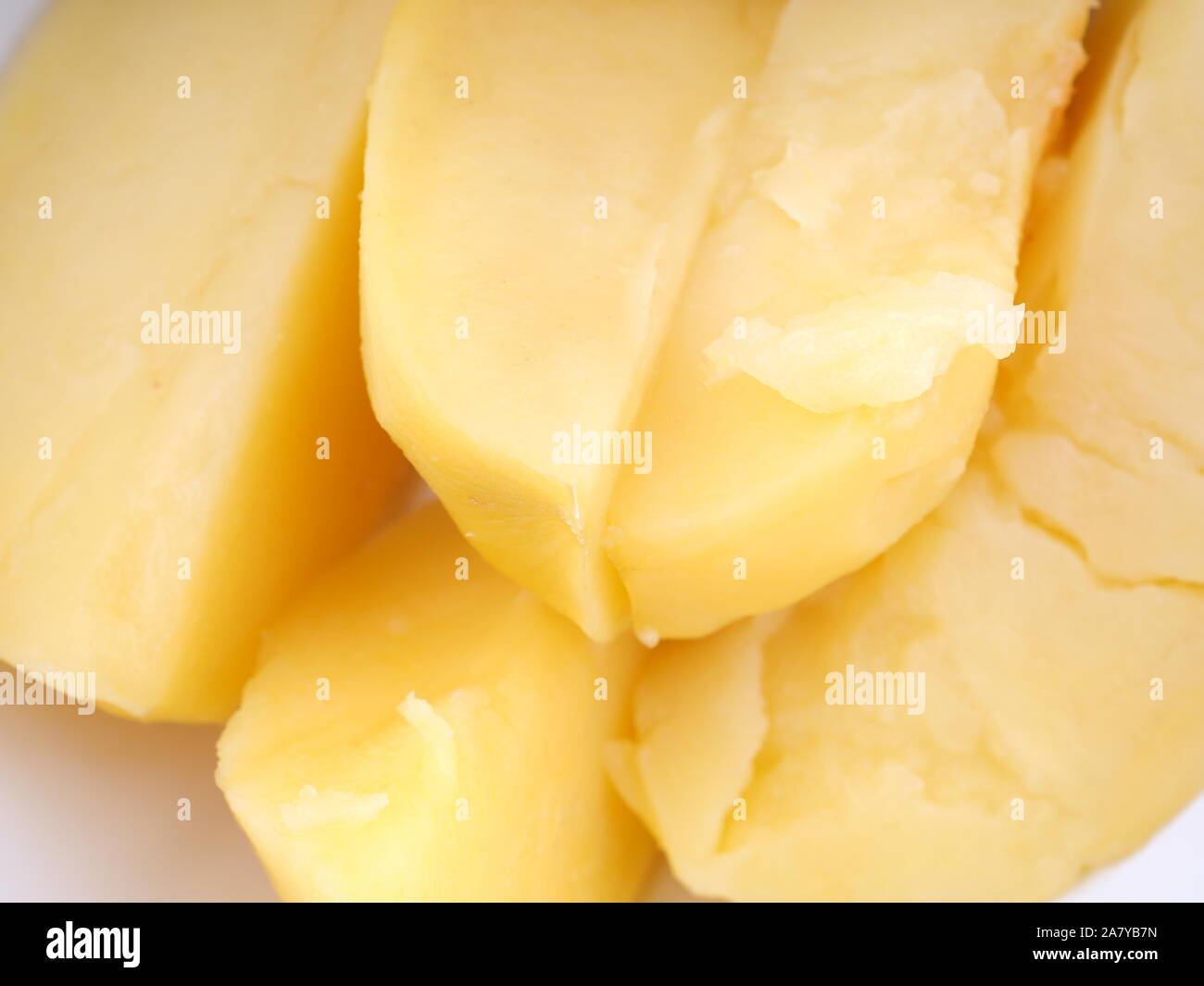 boiled potatoes on white background Stock Photo - Alamy