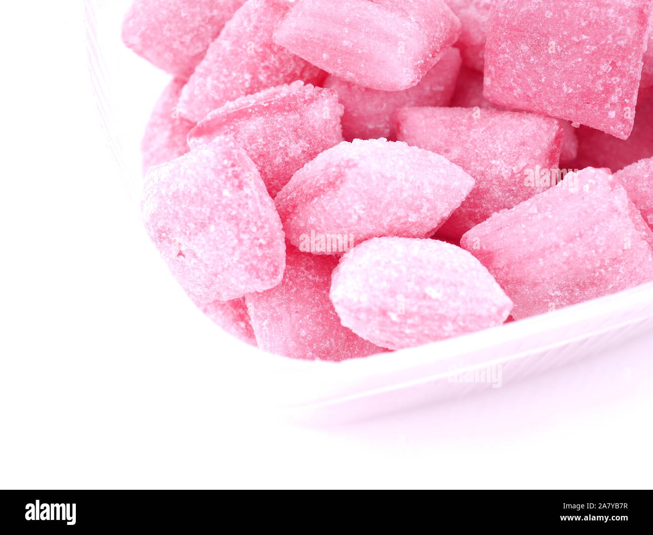 pink candy on a white background Stock Photo - Alamy