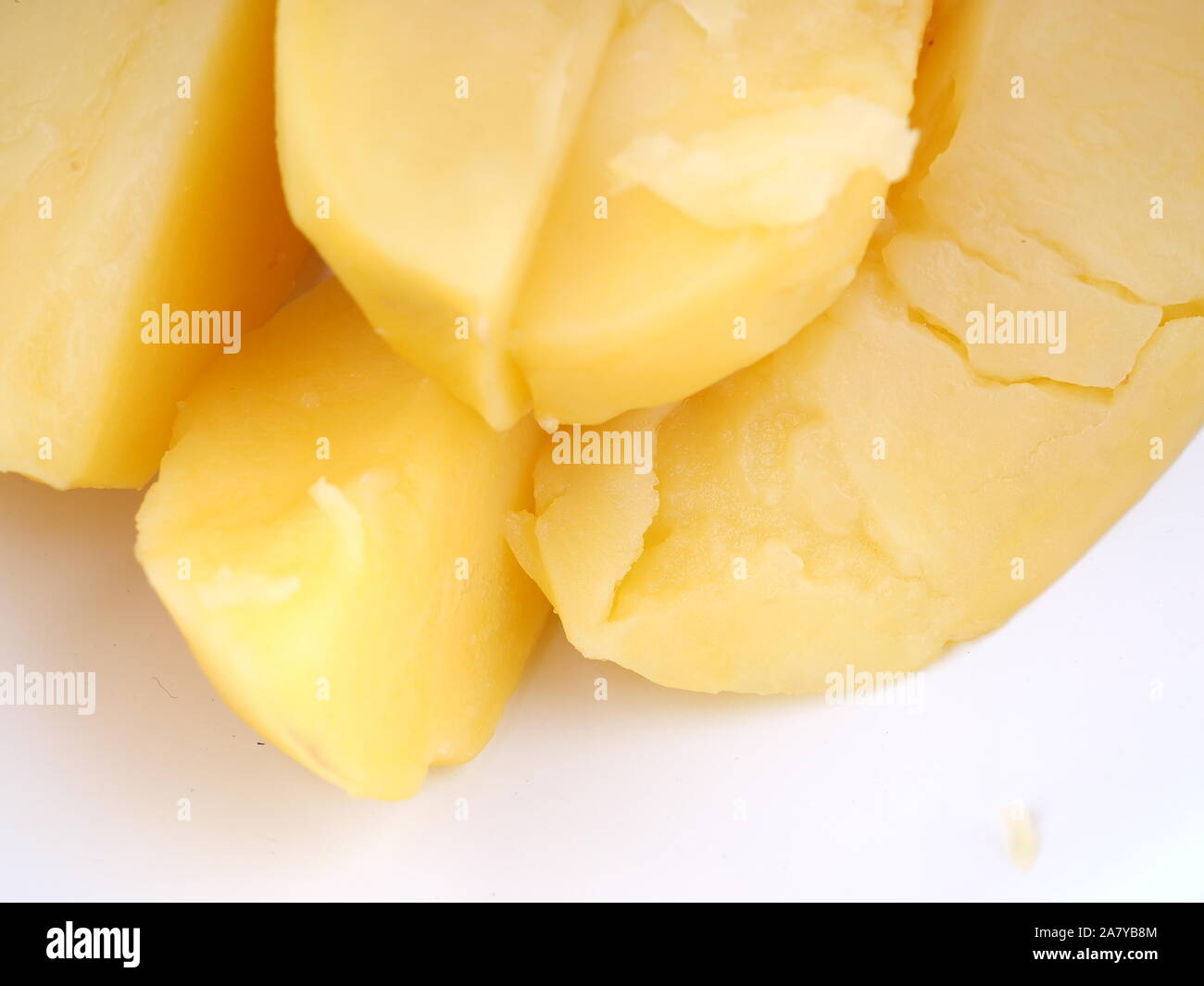 boiled potatoes on white background Stock Photo - Alamy
