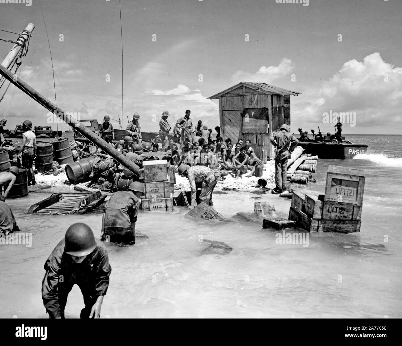 World War II Photo - wounded Japanese prisoners are examined and await ...