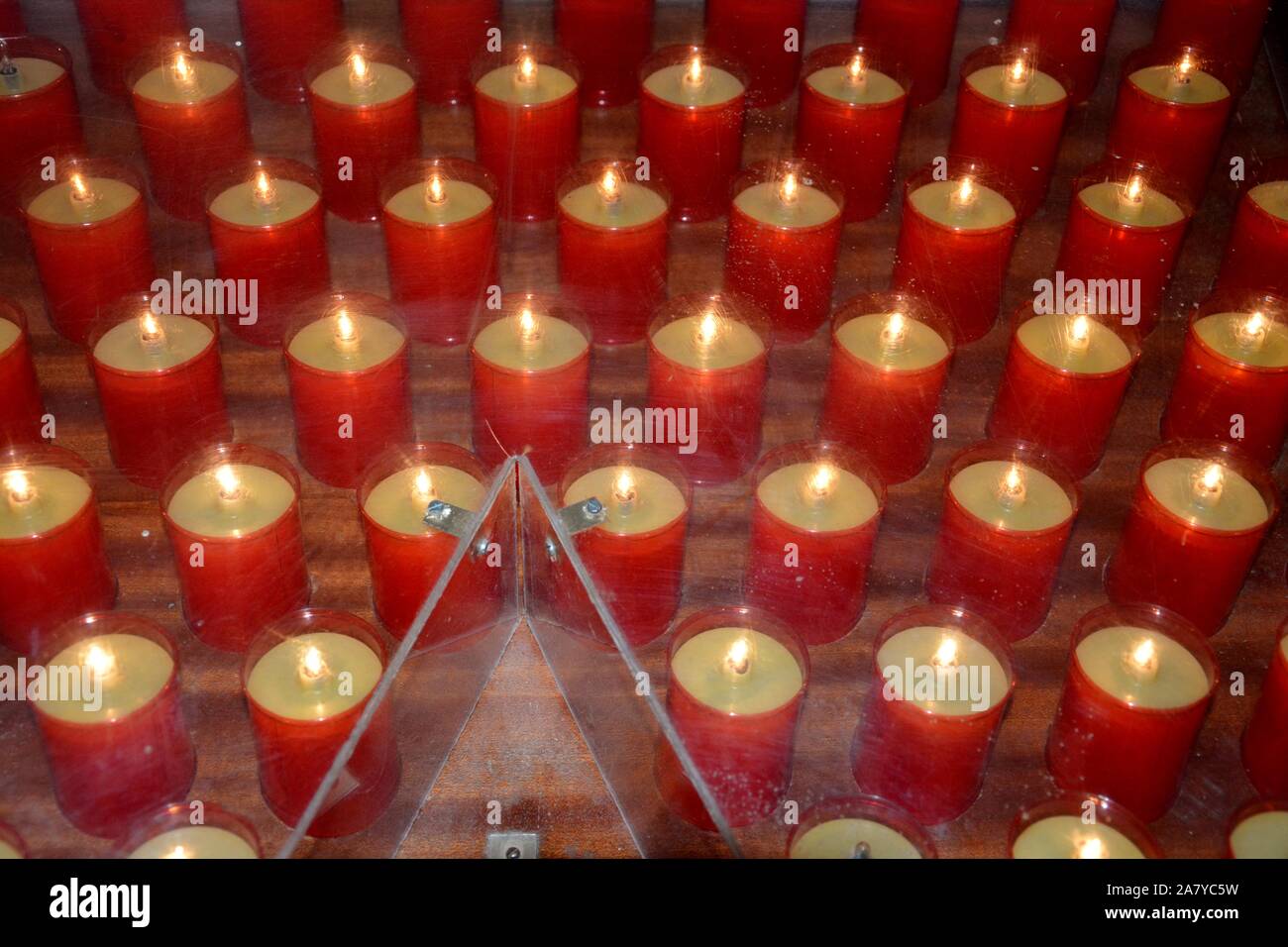 red candles in a row Stock Photo - Alamy