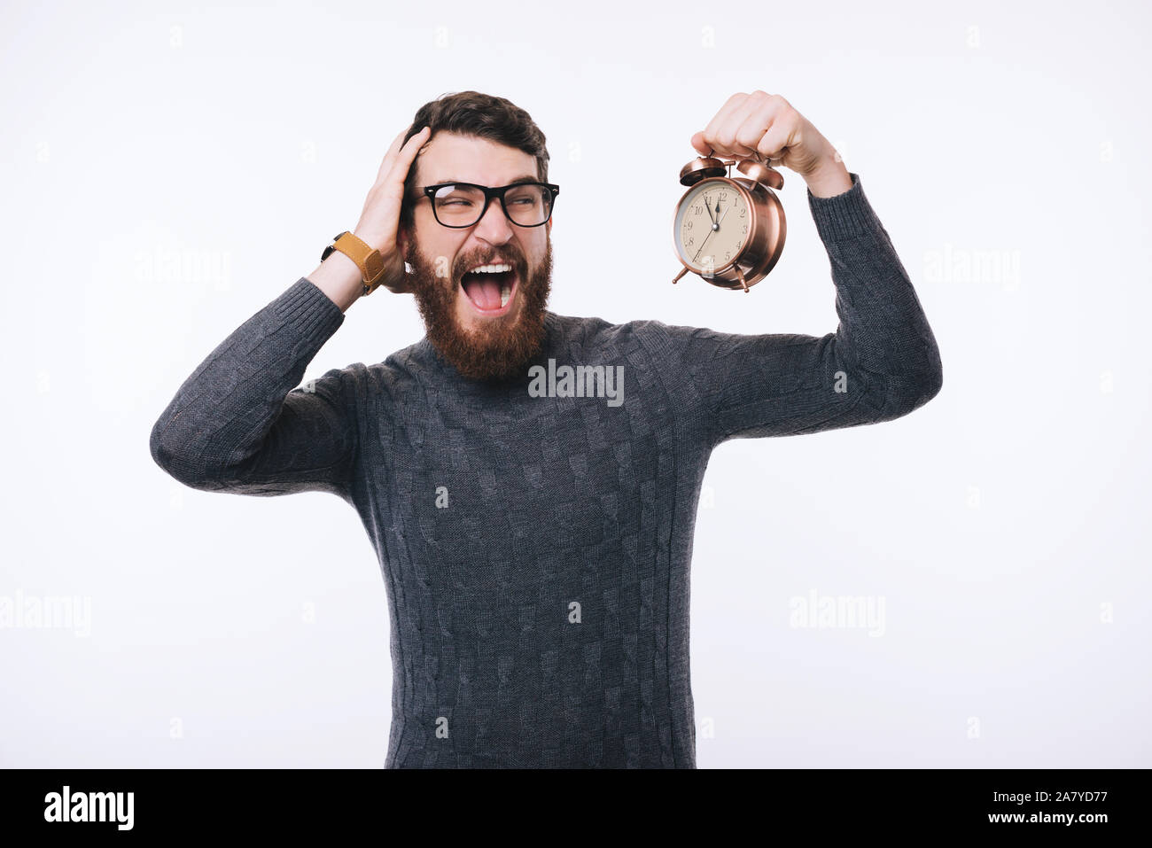 Stressed worker looking at watch hi-res stock photography and images ...