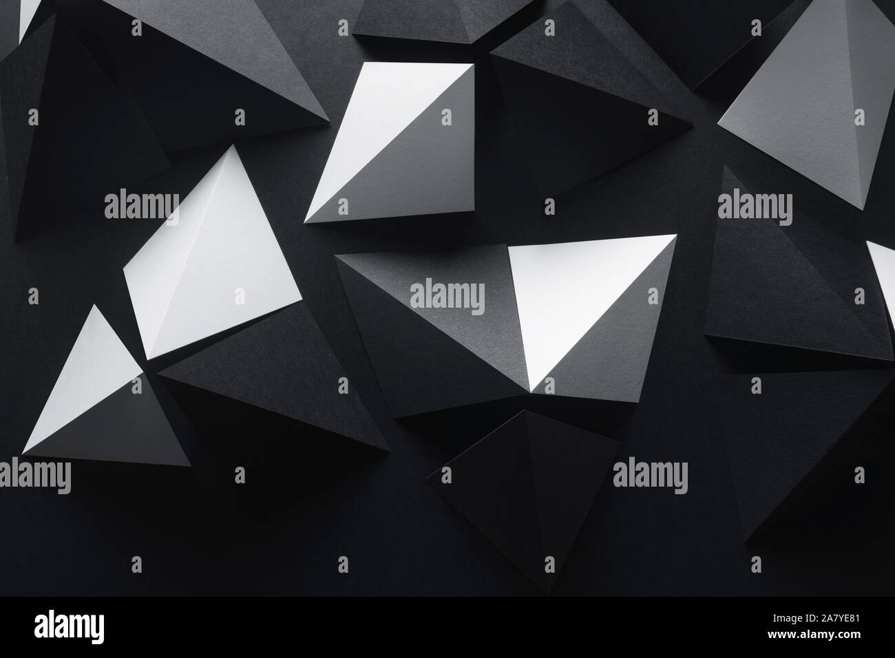 Geometric shapes of paper white and black, dark abstract background ...