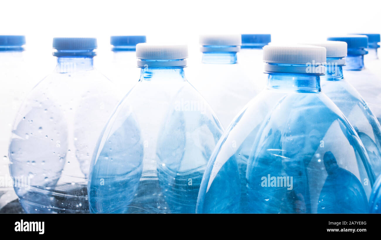 Recycling concept: empty blue water plastic bottle on white background ...
