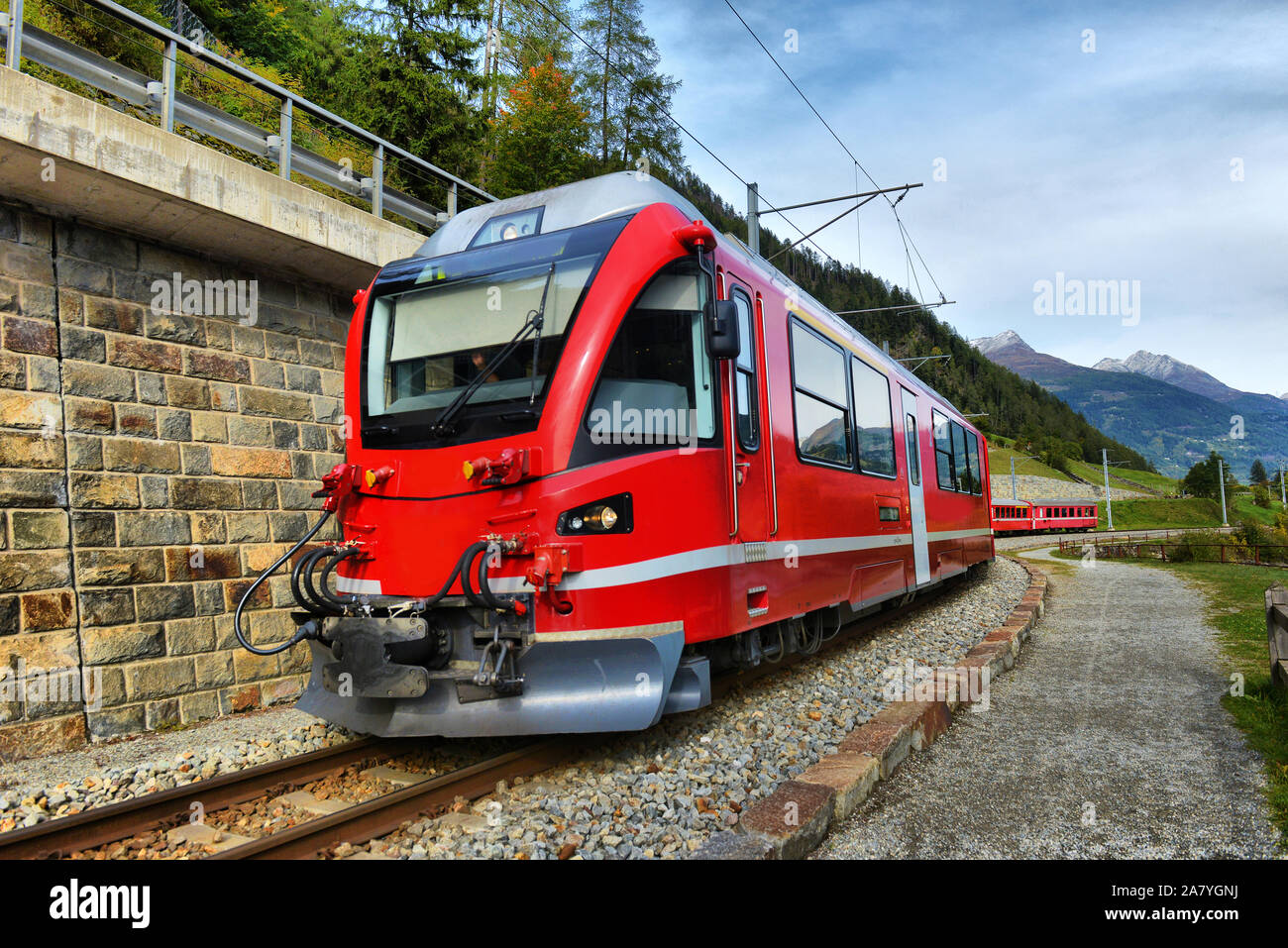 Bernina Express train in the mountains of Switzerlandm Switzerland ...