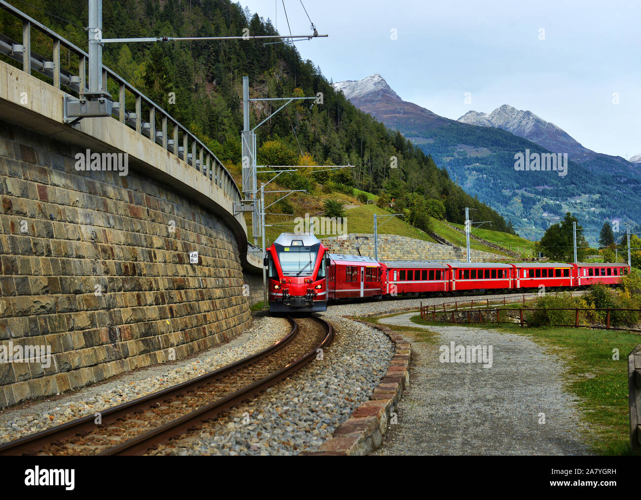 Bernina Express train in the mountains of Switzerlandm Switzerland ...