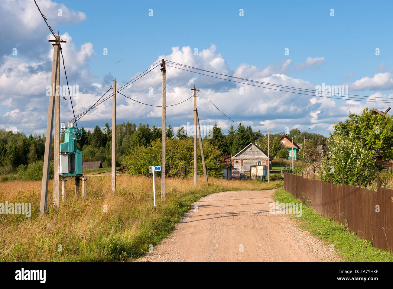 Electricity transformer substation mounted on the side of a country ...
