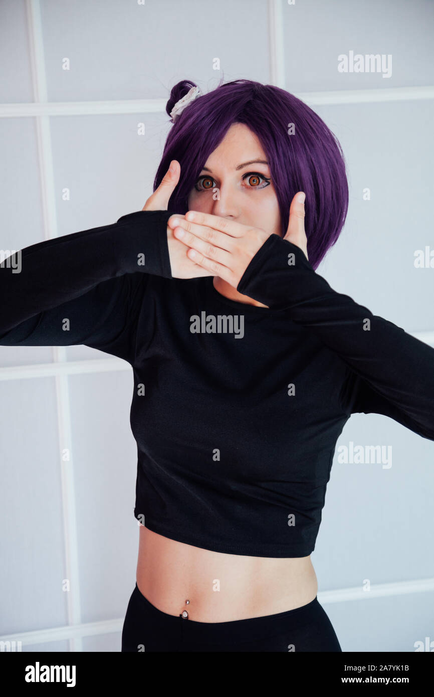 fashionable woman with purple hair anime Japan cosplay Stock Photo - Alamy