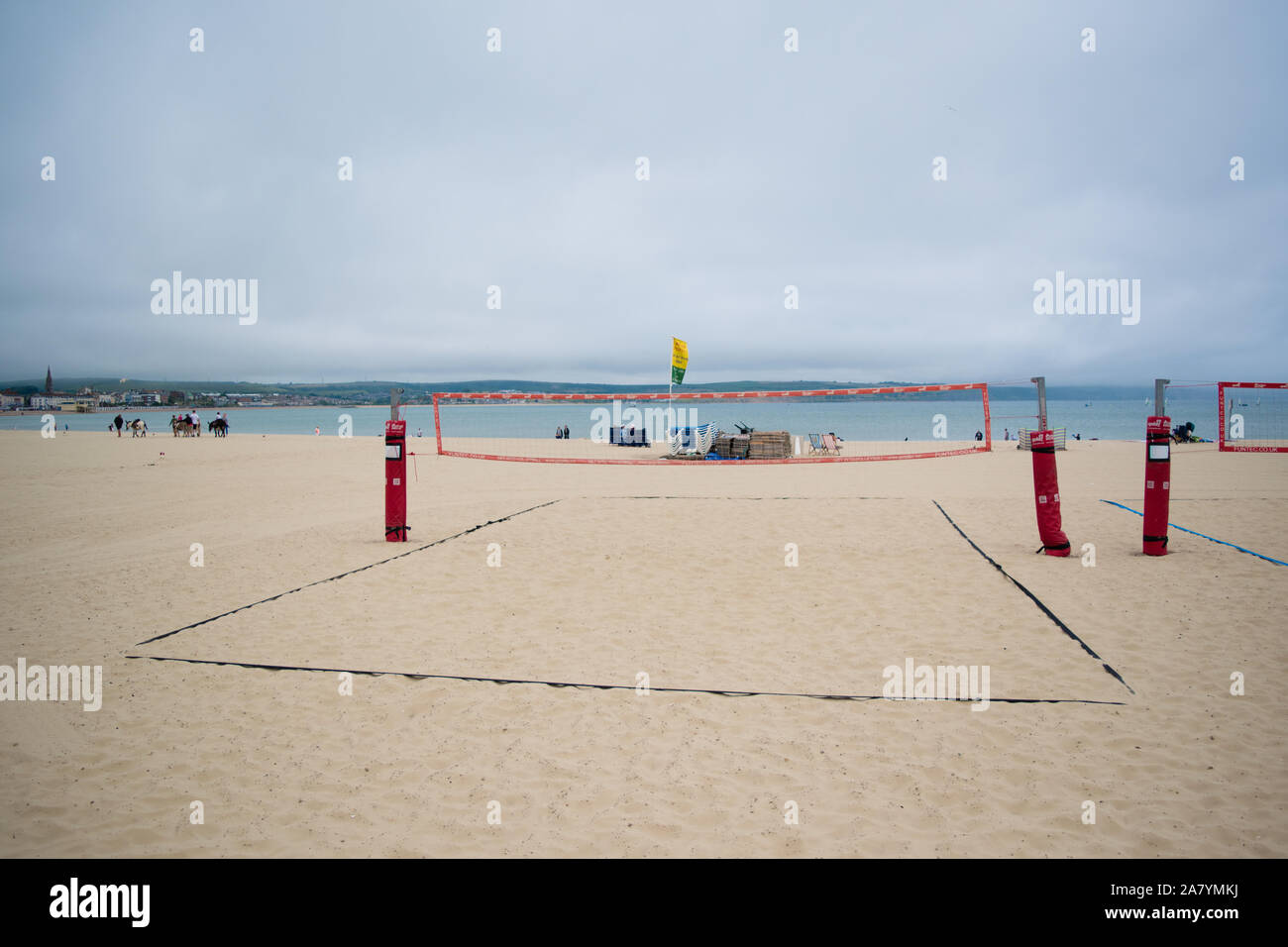 View of an empty beach volleyball pitch on the seafront in Weymouth ...