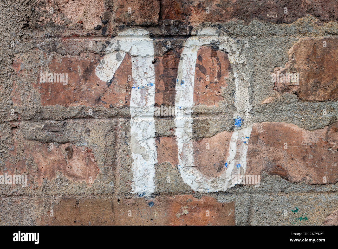 Street number sign on the wall Stock Photo - Alamy