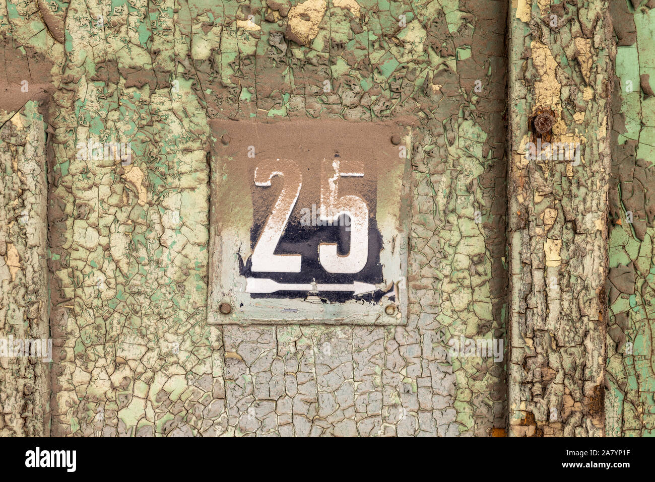 Street number sign on the wall Stock Photo - Alamy