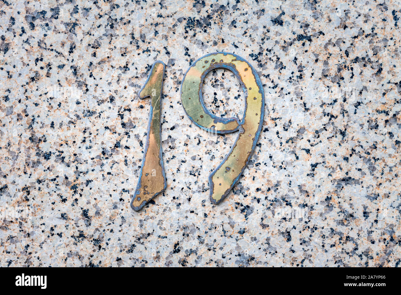 Street number sign on the wall Stock Photo - Alamy