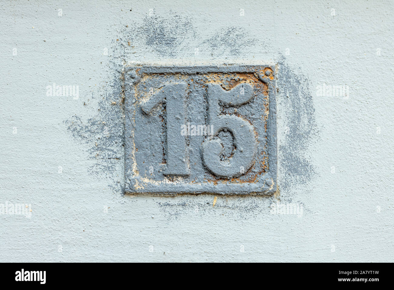 Street number sign on the wall Stock Photo - Alamy