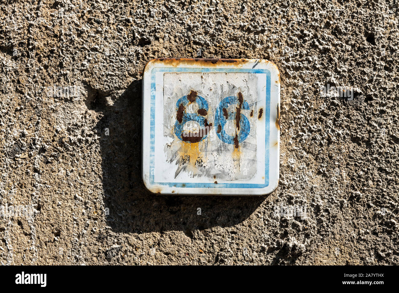 Street number sign on the wall Stock Photo - Alamy