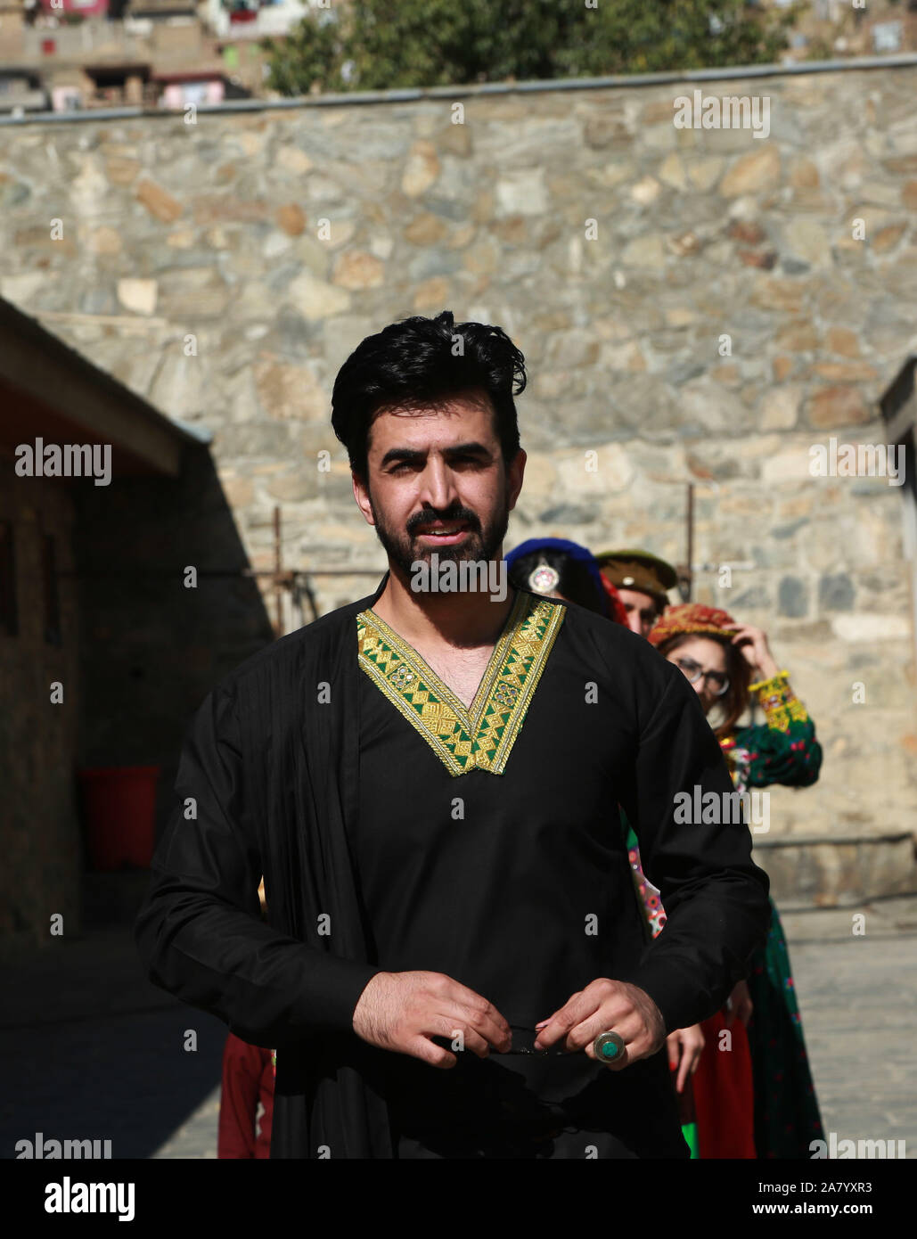 Kabul, Afghanistan. 4th Nov, 2019. A model poses for photos after ...