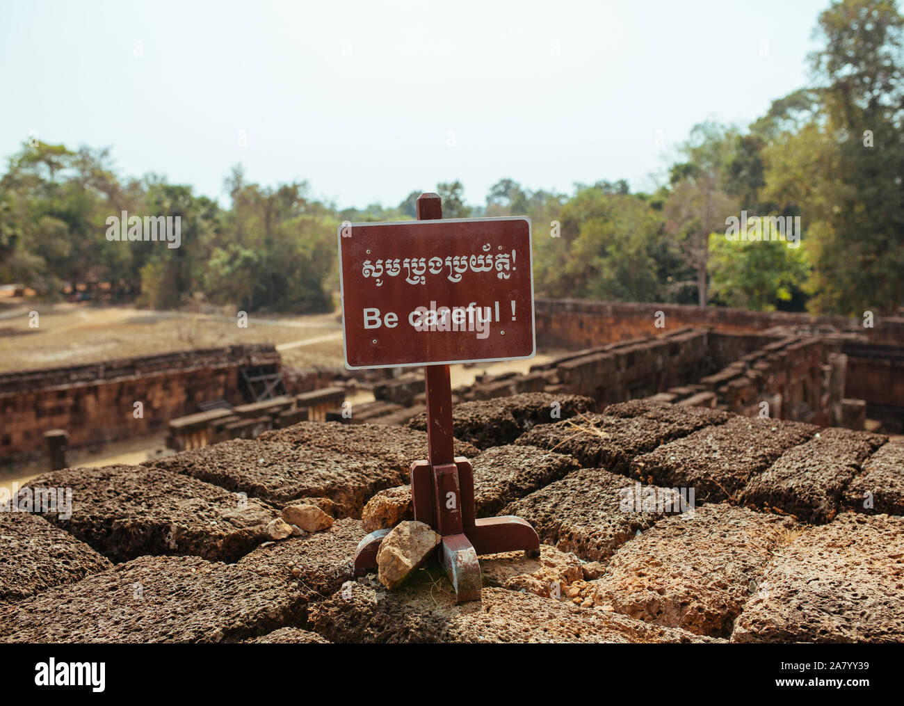 Be Careful Warning sign in Angkor Wat Temple Stock Photo - Alamy