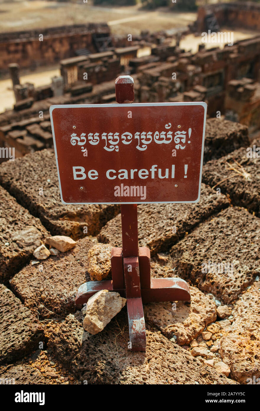 Be Careful Warning sign in Angkor Wat Temple Stock Photo - Alamy