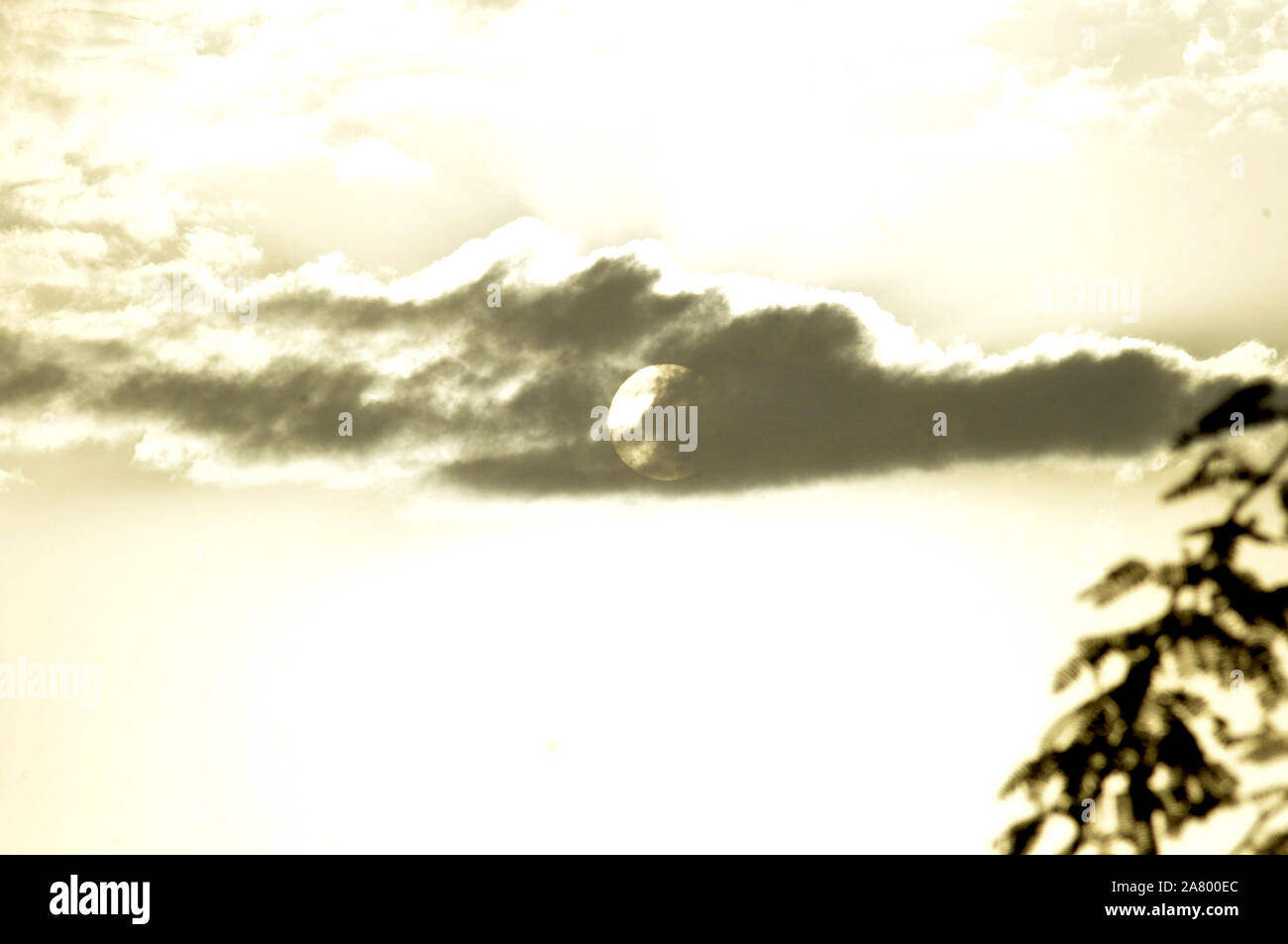 The Sun behind the Clouds in the Sky. Photo/Sumit Saraswat Stock Photo ...