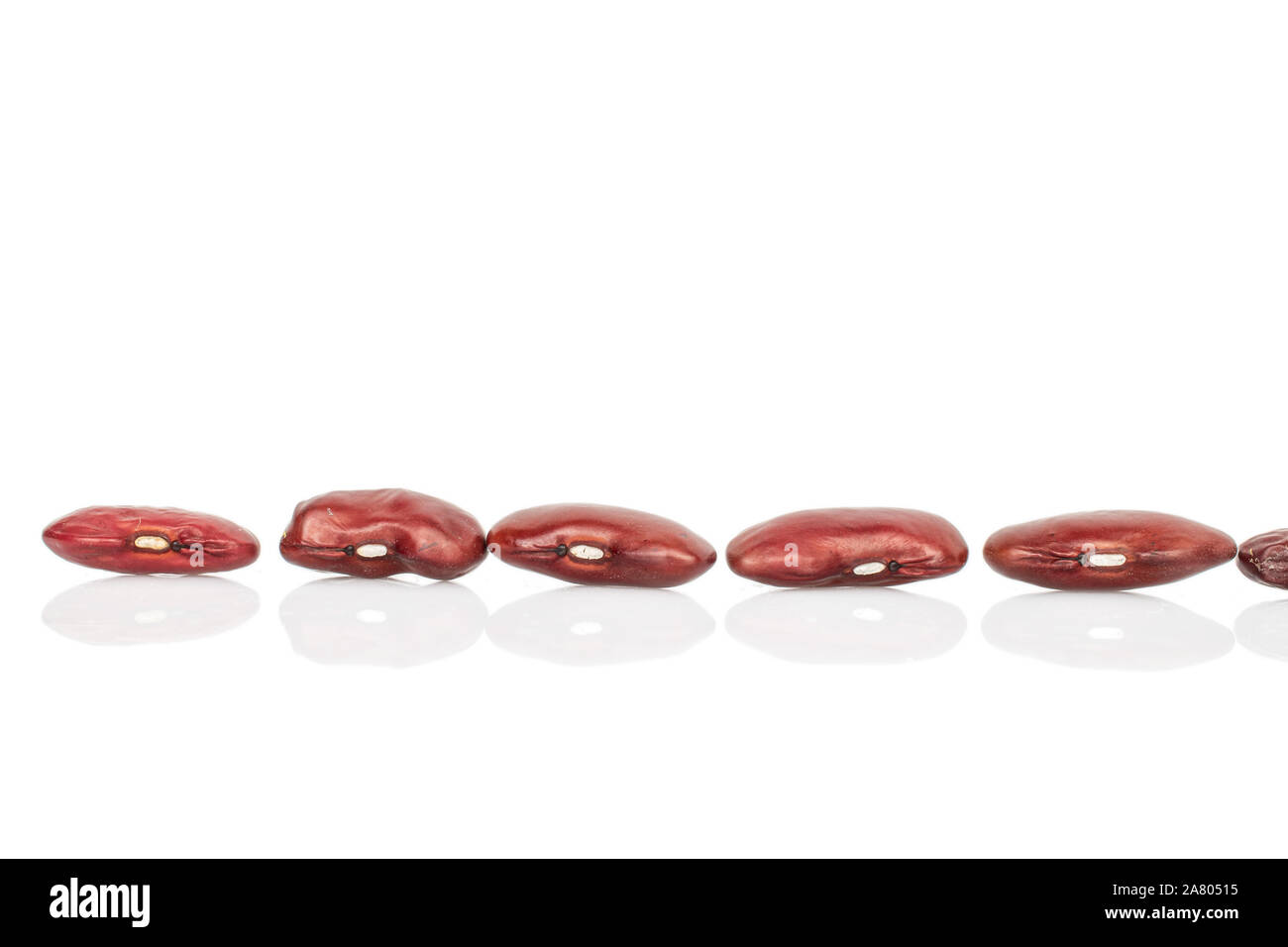Group of five whole fresh red kidney beans isolated on white background ...
