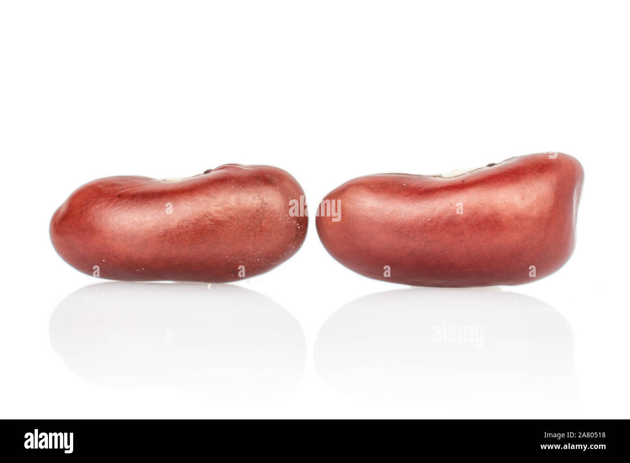 Group of two whole fresh red kidney beans isolated on white background ...