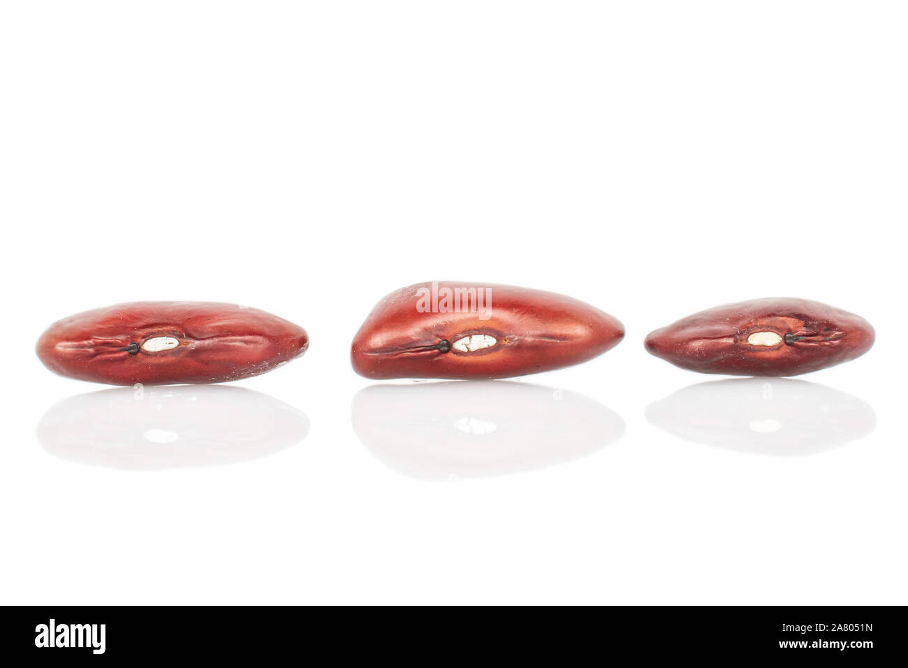 Group of three whole tasty fresh red kidney beans isolated on white ...