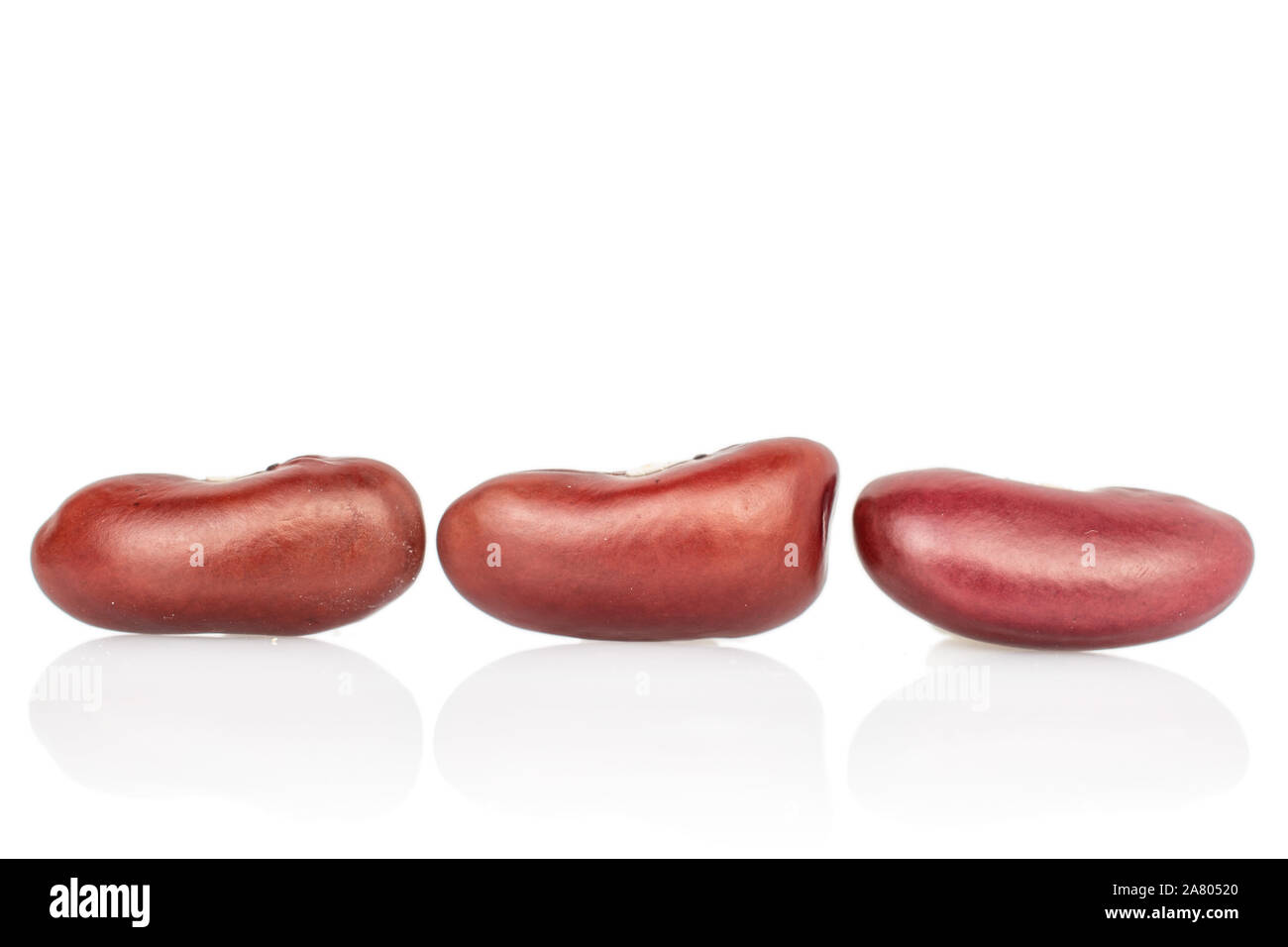Group of three whole fresh red kidney beans isolated on white ...