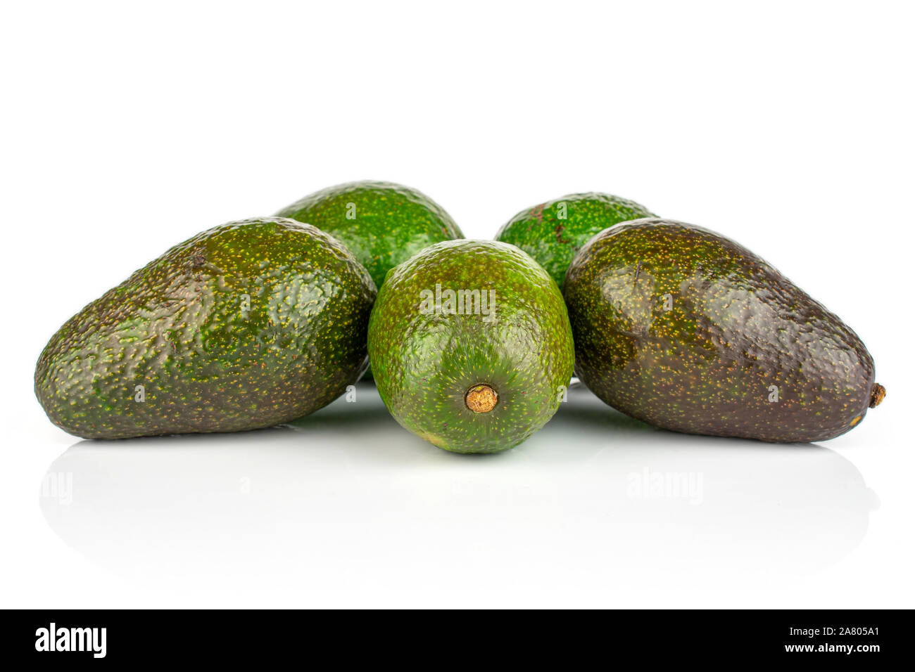 Group of five whole fresh green avocado isolated on white background ...