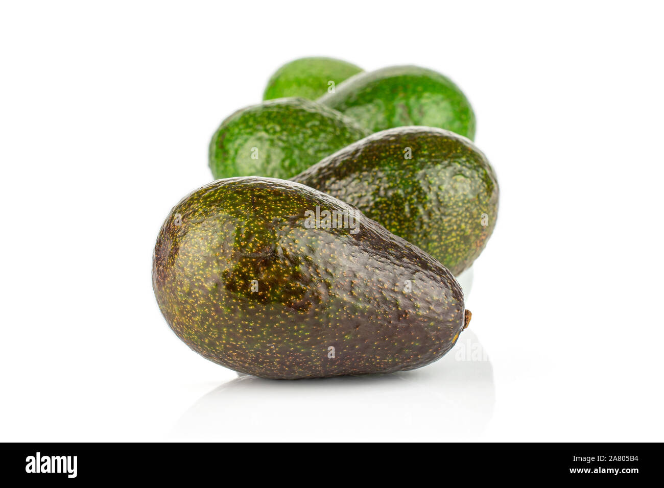 Group of five whole fresh green avocado isolated on white background ...