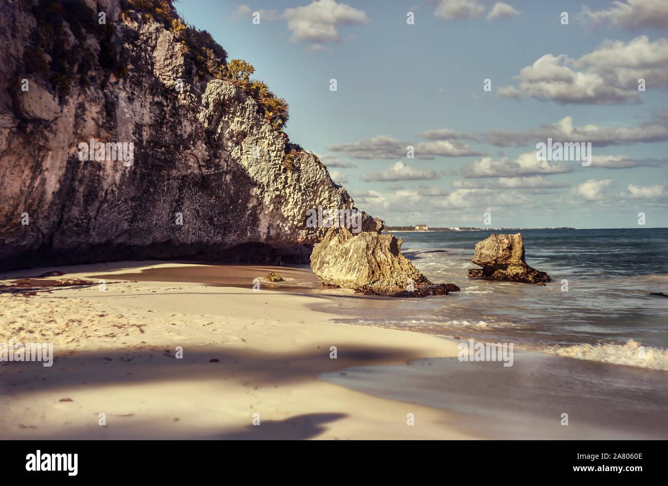 Rocks, sand and sea Stock Photo - Alamy