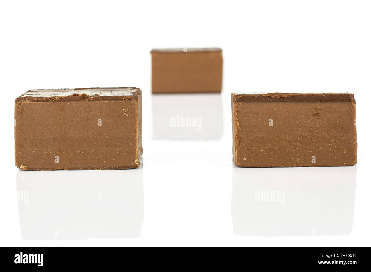Group of three whole sweet brown viennese nougat isolated on white ...