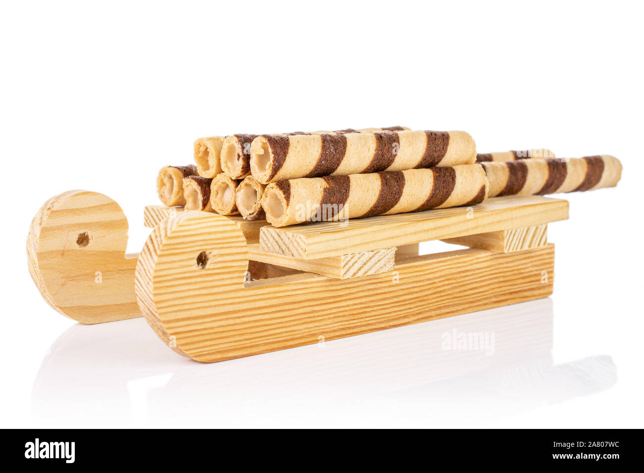 Group of eight whole crunchy beige hazelnut rolled wafer biscuit with ...