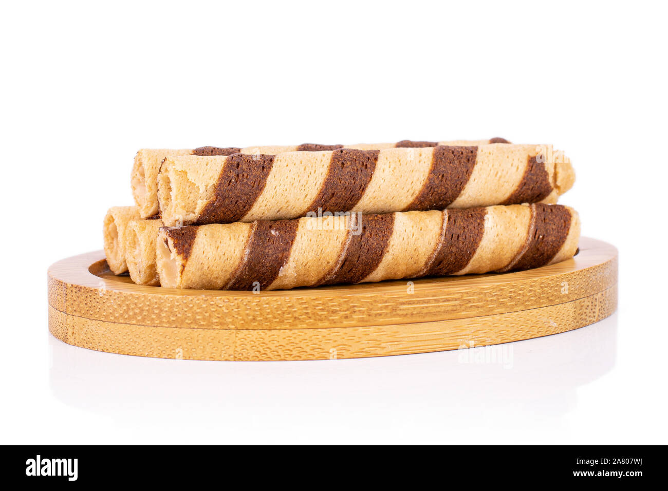 Group of five whole crunchy beige hazelnut rolled wafer biscuit on ...