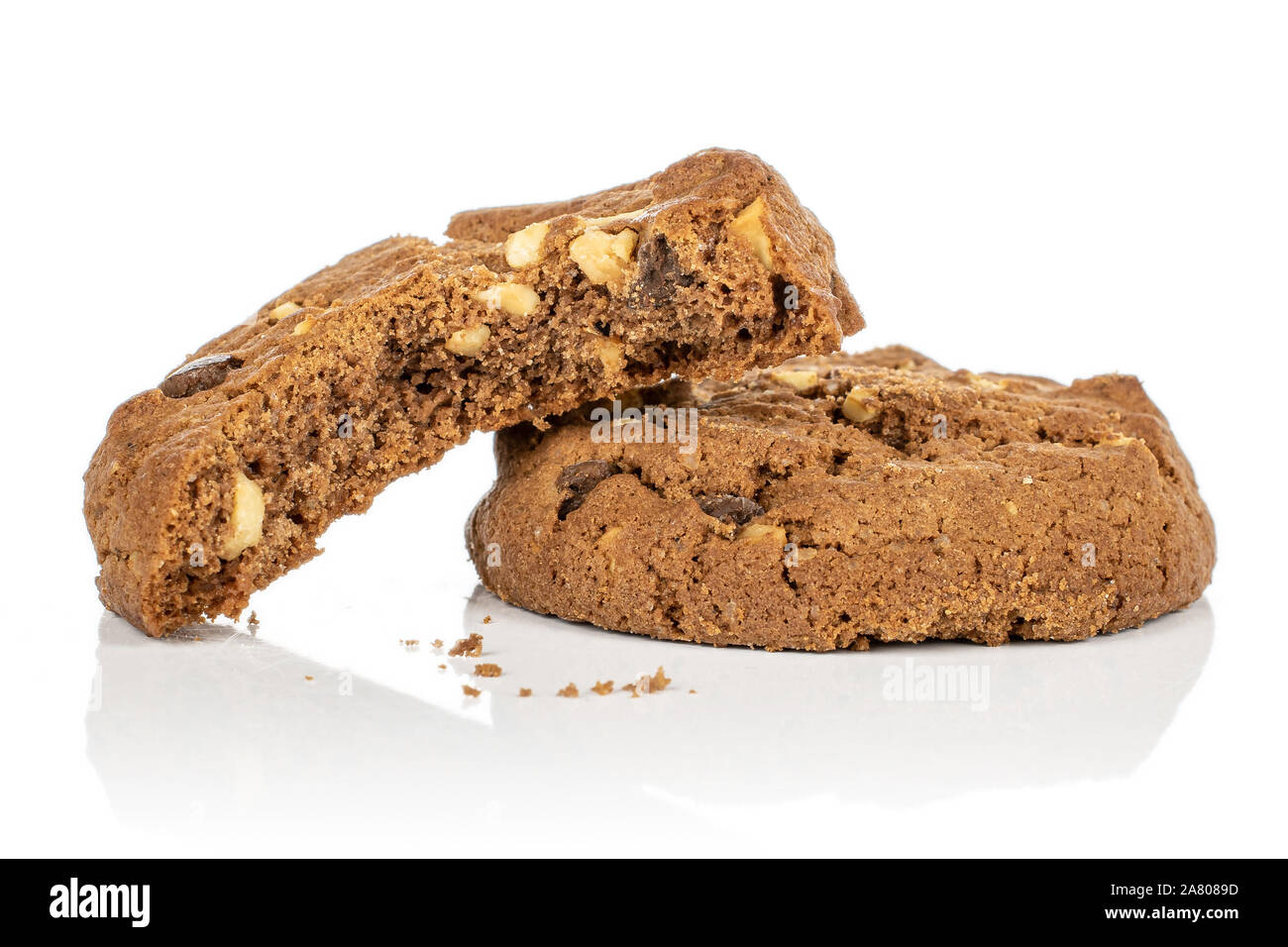 Group of one whole one half of sweet brown cookie isolated on white ...