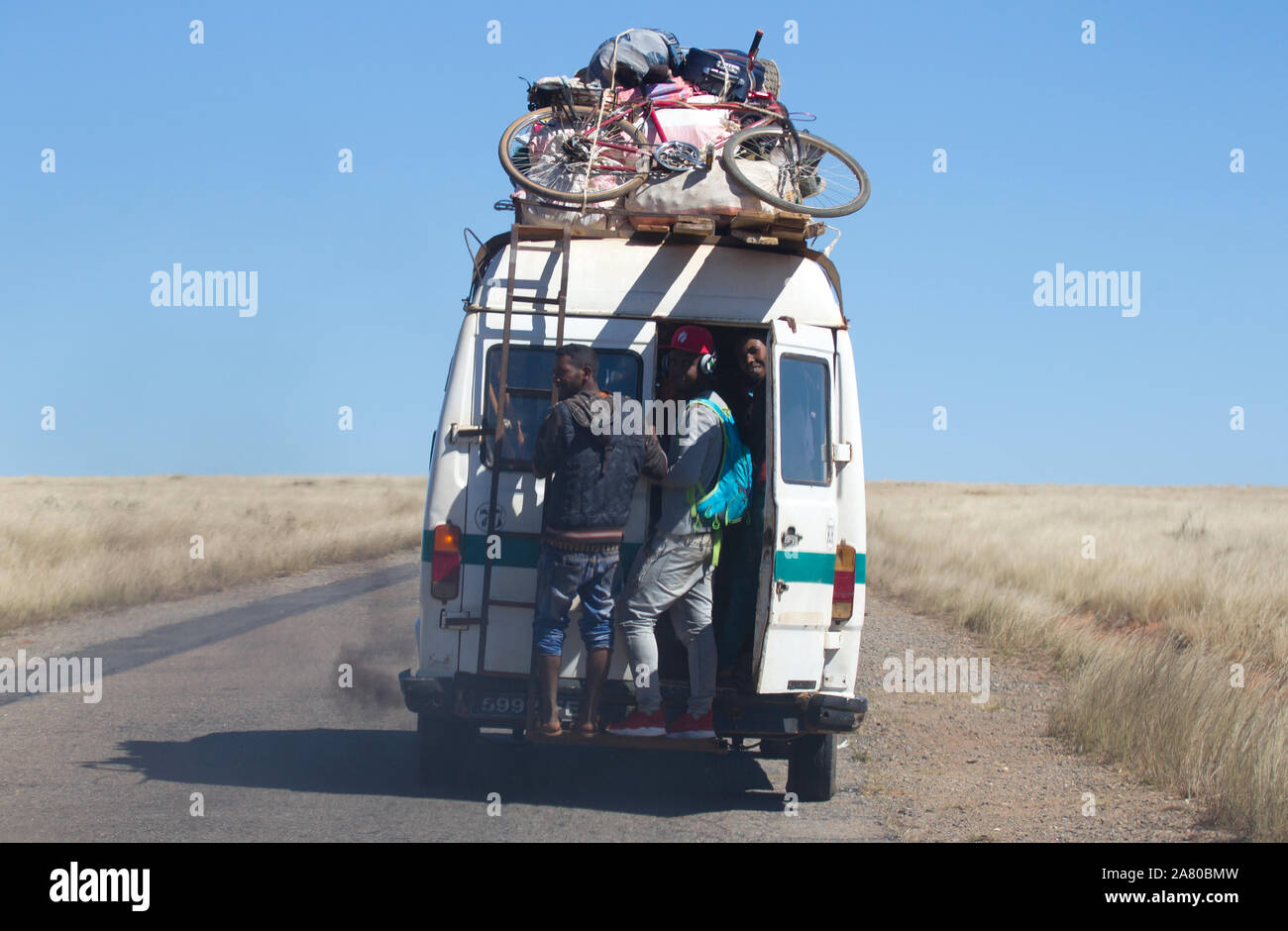 Madagascar on july 30, 2019 - Overloaded bus moves through the vastness ...